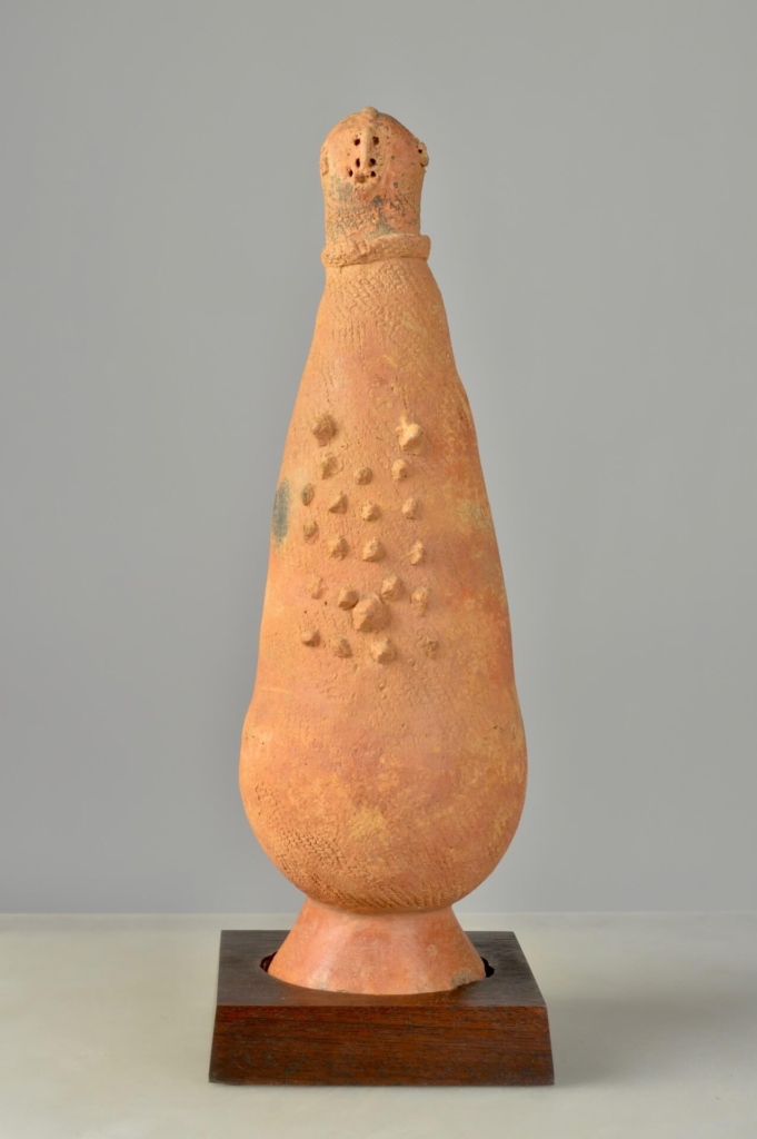 Rare, Complete Bura Bottle Figure