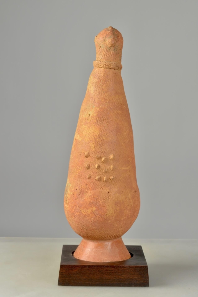 Rare, Complete Bura Bottle Figure
